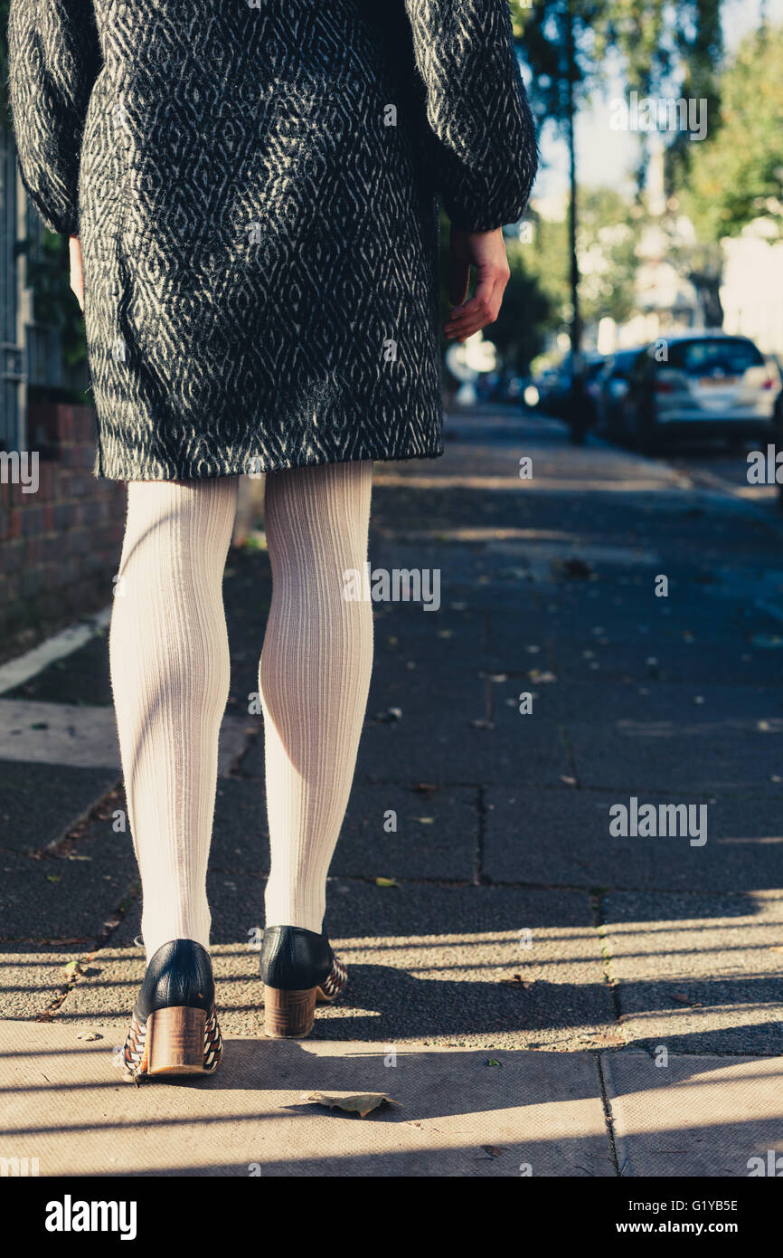 Town woman walking legs hi-res stock photography and images - Alamy