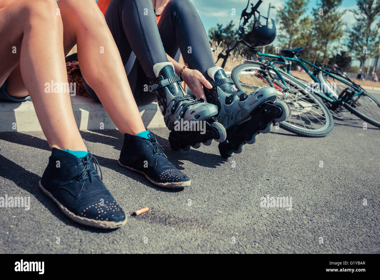Two women rollerblading active woman hi-res stock photography and ...