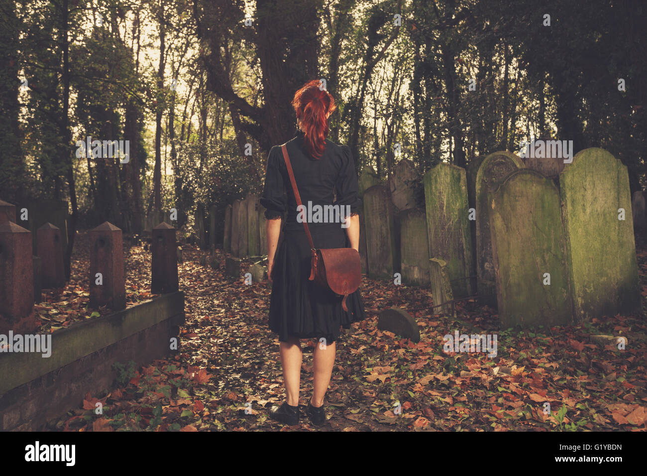 A person walking in a cemetery hi-res stock photography and images - Alamy