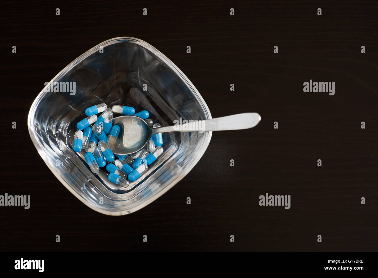 Healthcare drug capsules spoon hi-res stock photography and images - Alamy