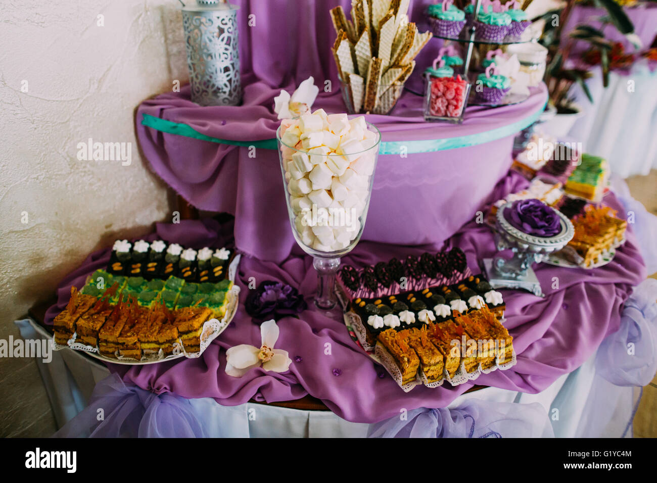 Sweet dessert table or candy bar. Wedding party. Natural light. Macaron ...