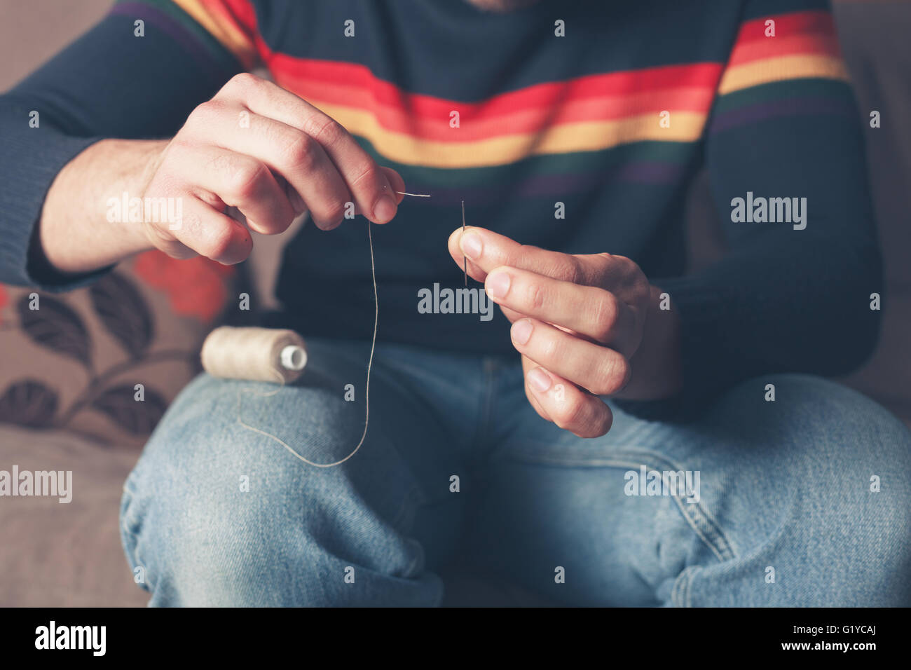 Threading the needle hi-res stock photography and images - Alamy