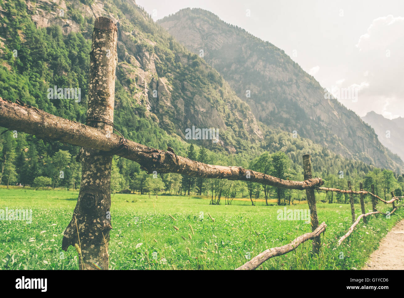 Fence in a valley Stock Photo - Alamy