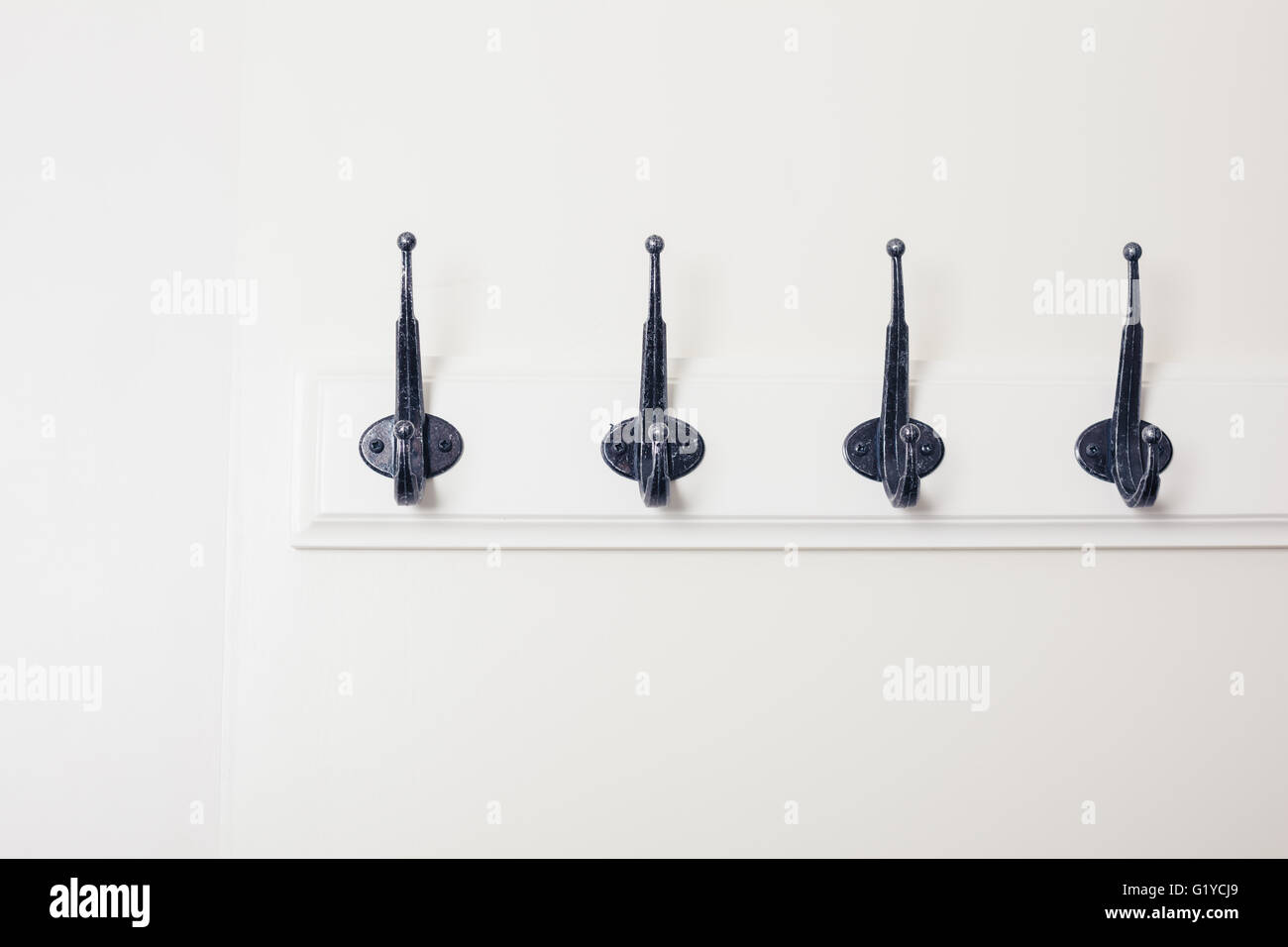 Coat hooks and wall hi-res stock photography and images - Alamy