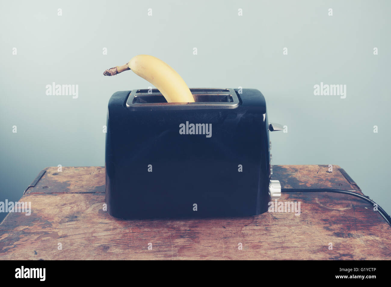 A banana in a toaster Stock Photo - Alamy