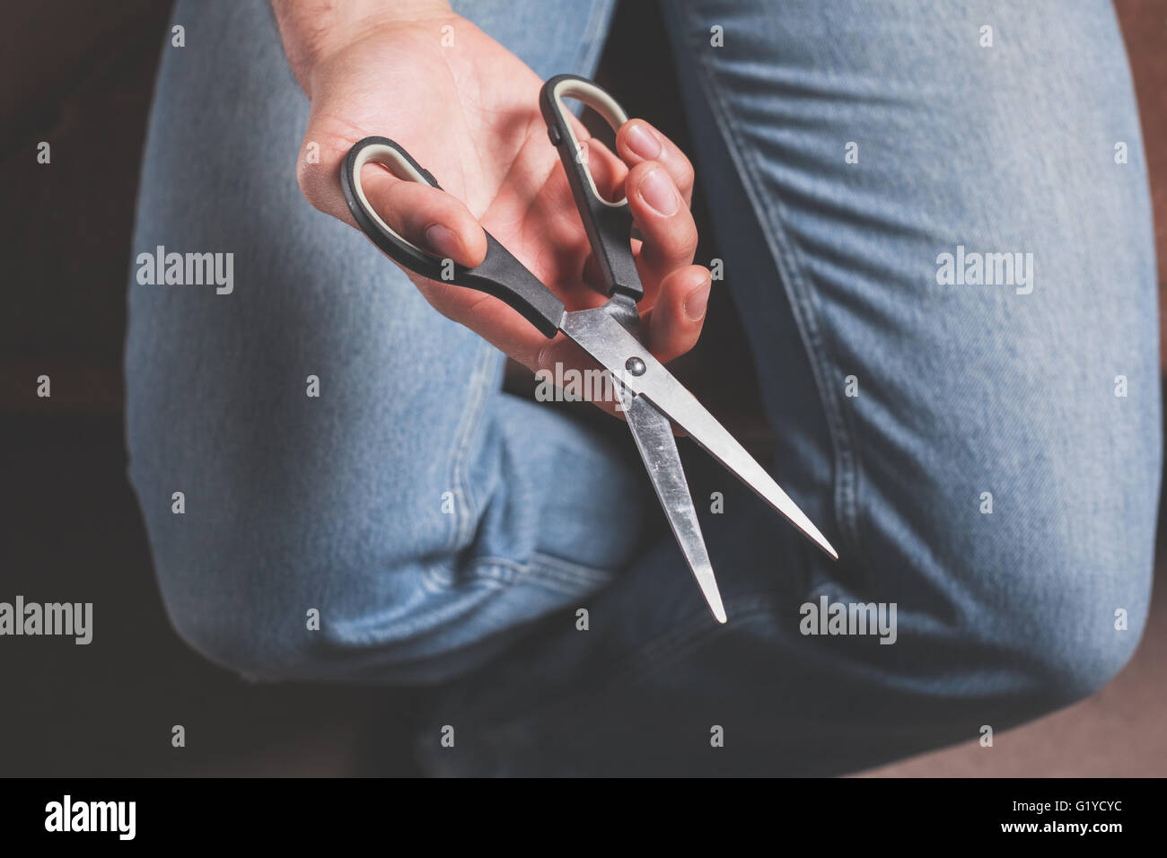 Man with scissors hi-res stock photography and images - Alamy