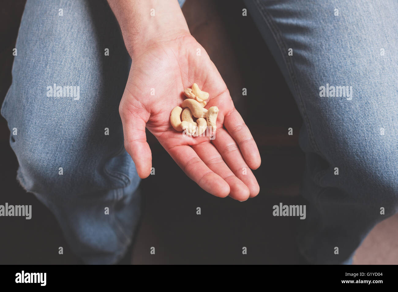 Hands holding nuts hi-res stock photography and images - Alamy