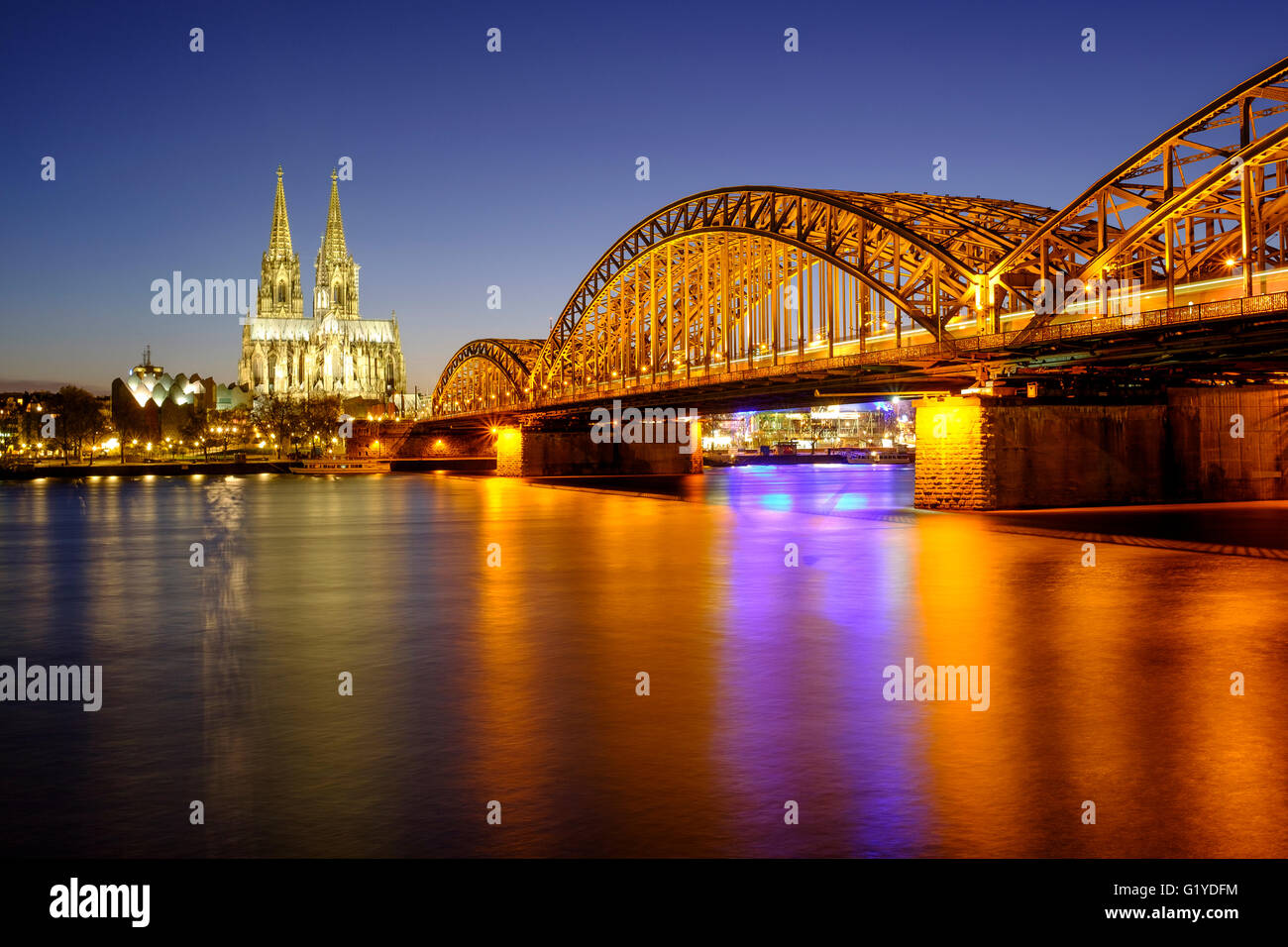 Cologne Cathedral with Hohenzollern Bridge over the Rhine, Dusk ...