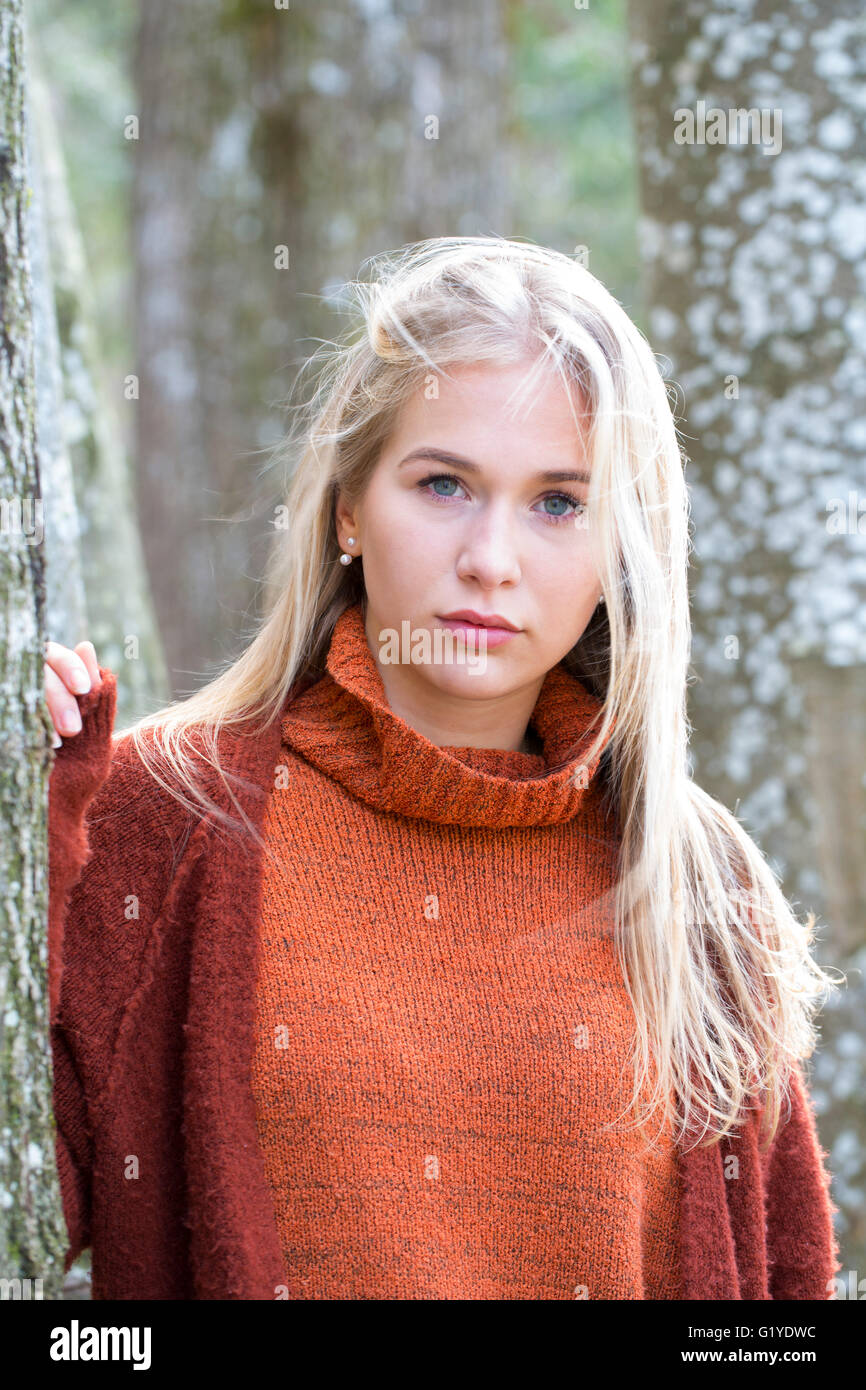 Girl by a tree hi-res stock photography and images - Alamy