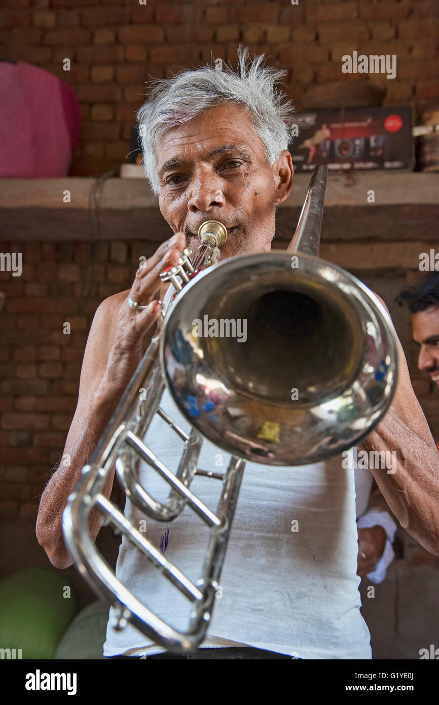 Man playing brass instrument hi-res stock photography and images - Alamy