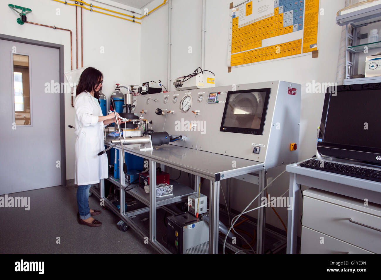 Geologist at the high-pressure apparatus in the laboratory Stock Photo ...