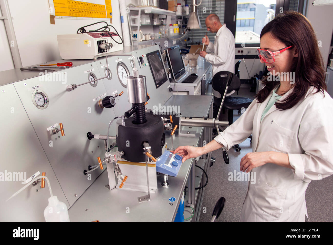 Geologist at the high-pressure apparatus in the laboratory Stock Photo ...