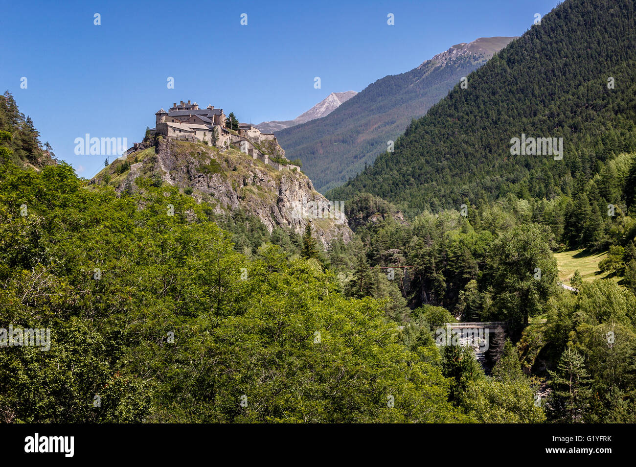 Middle Age castle and forest, Queyras region, Souther French Alps ...