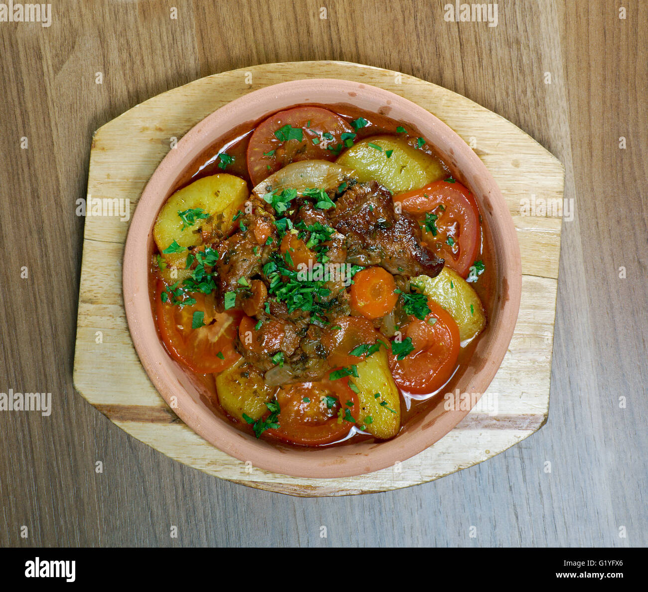 Chanakhi traditional Georgian dish of lamb stew with tomatoes ...