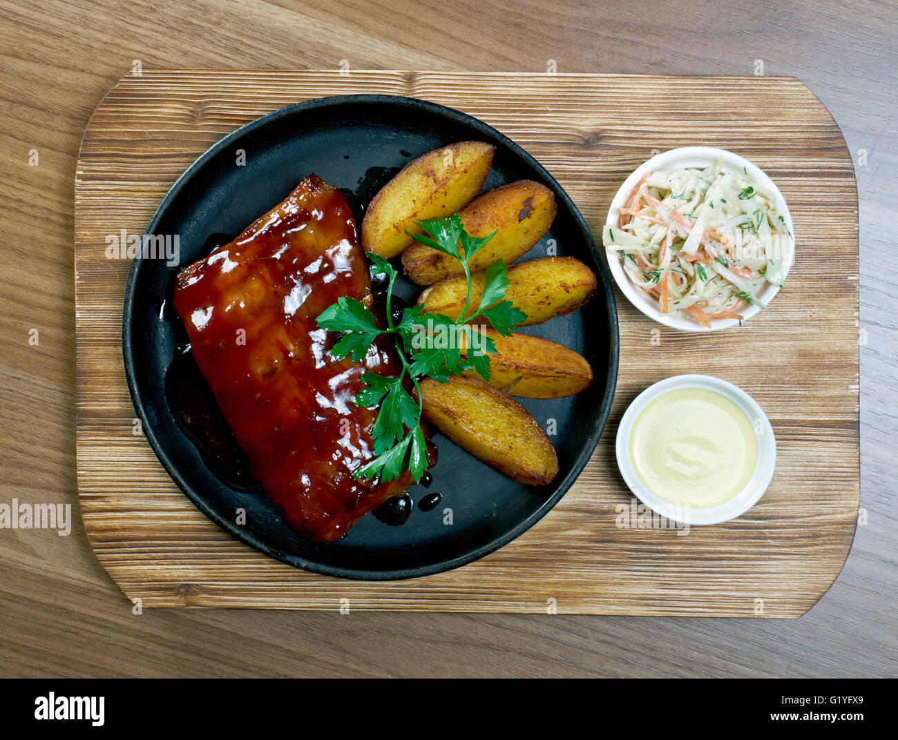 Grilled caramelized pork ribs in caramel sauce. close up Stock Photo ...