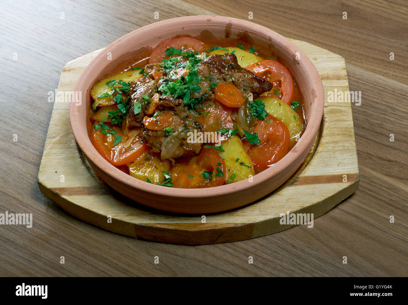 Chanakhi traditional Georgian dish of lamb stew with tomatoes ...