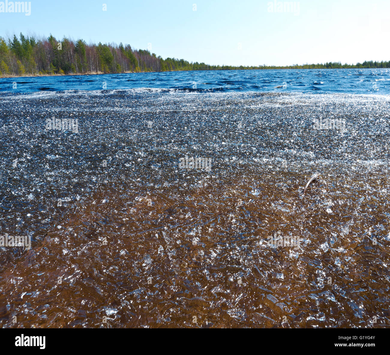 Russian Spring landscape with flooded.icy slush on the water of the ...