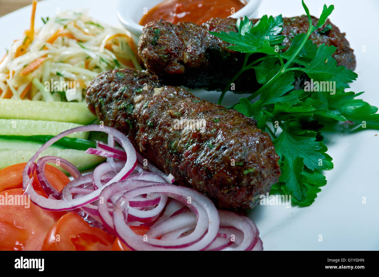 caucasian lamb Luleh kebab with vegetable Stock Photo - Alamy