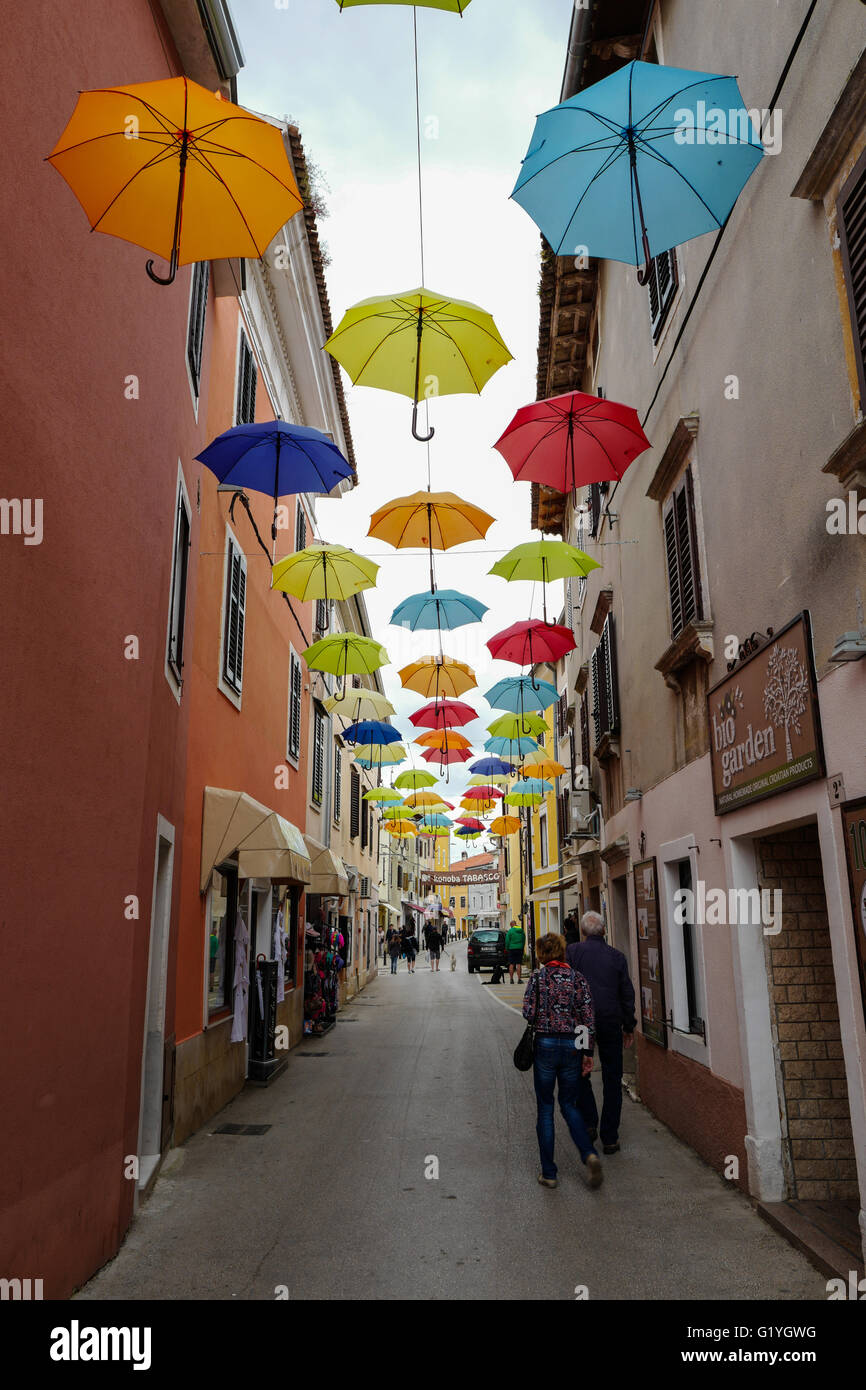 Colorful umbrellas above a street in Novigrad, Croatia Stock Photo - Alamy