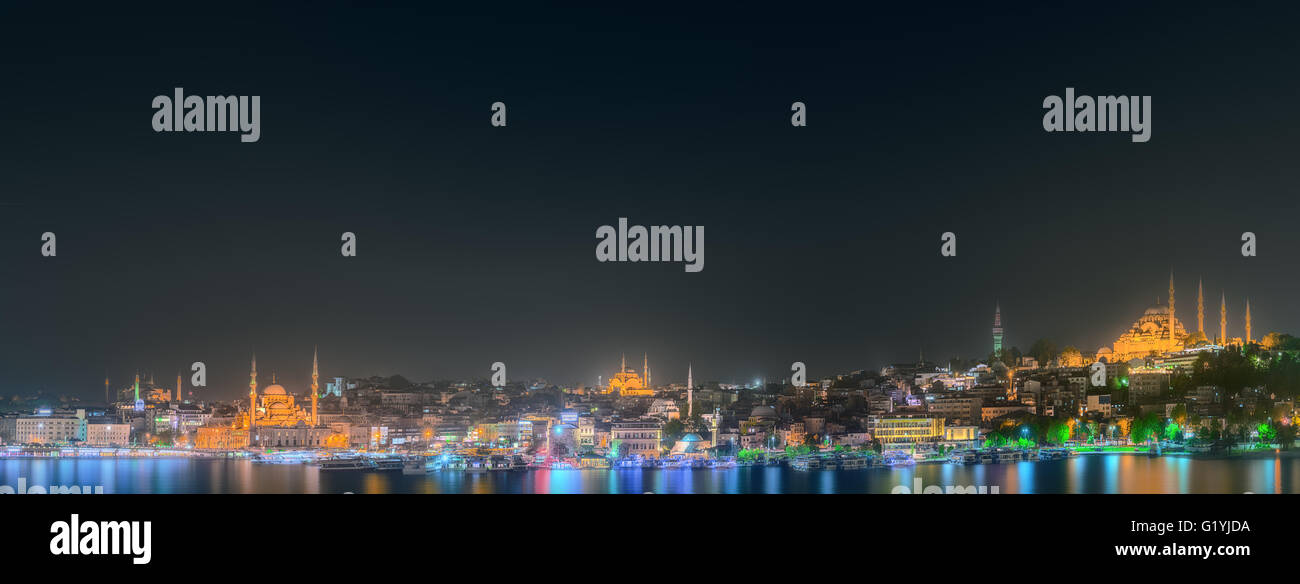 Istanbul skyline from Galata bridge by night, with Suleymaniye mosque ...