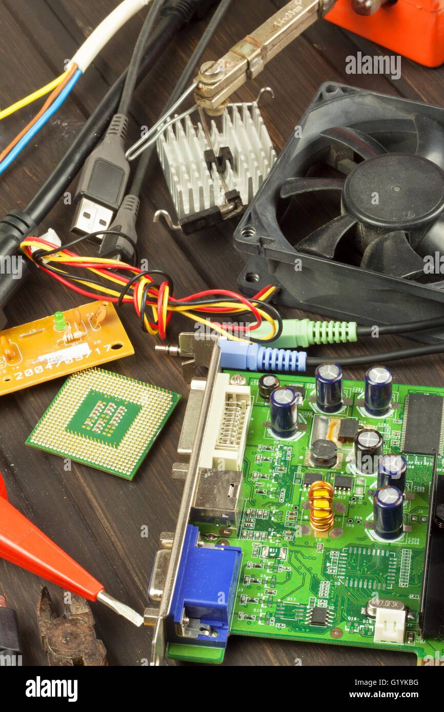 Desk technician for computers. Computer components on a workbench ...