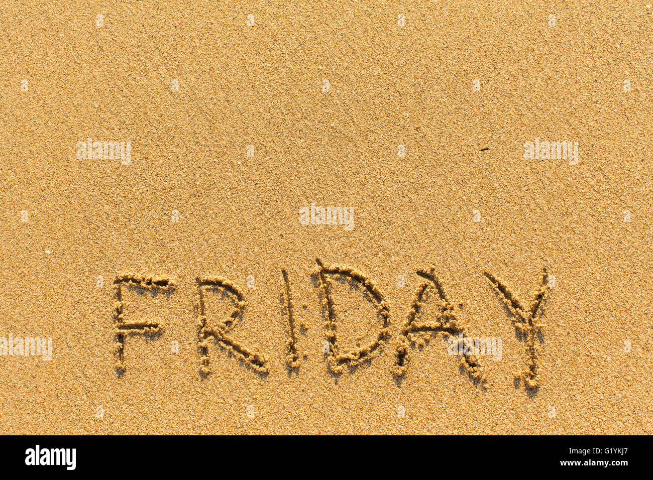 Friday - inscription by hand on a light-golden beach sand Stock Photo ...