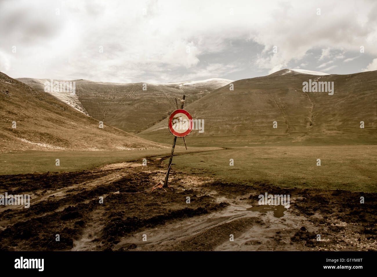 Wild road in a valley Stock Photo - Alamy