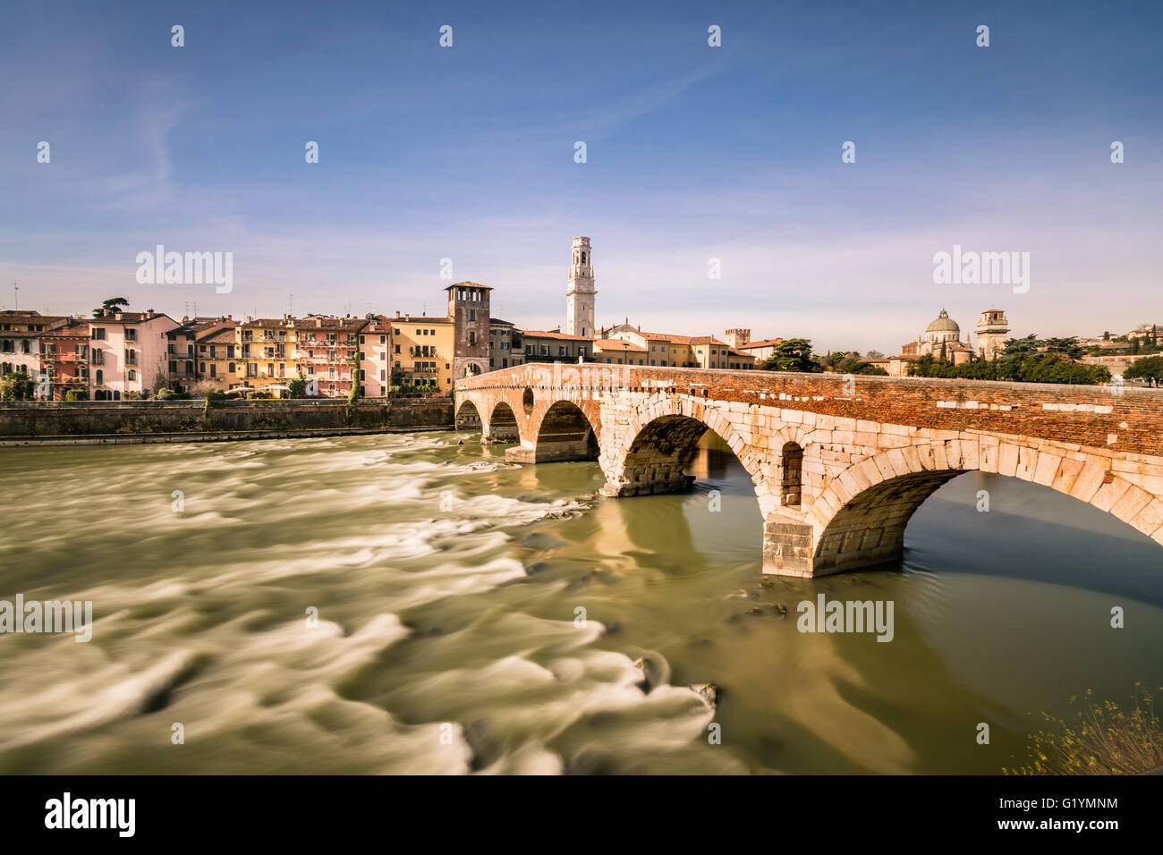 "Stone Bridge", the famous old bridge in Verona crosses the Adige river ...