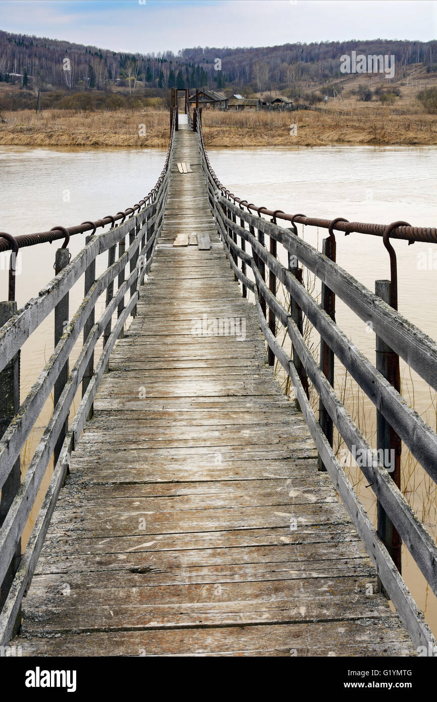 Suspended pedestrian bridge over the river Berd, in the village of ...