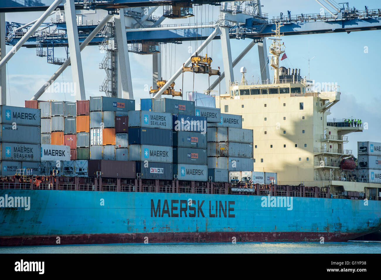 Containers are loaded on to the Maersk Container ship Maersk Jubail ...