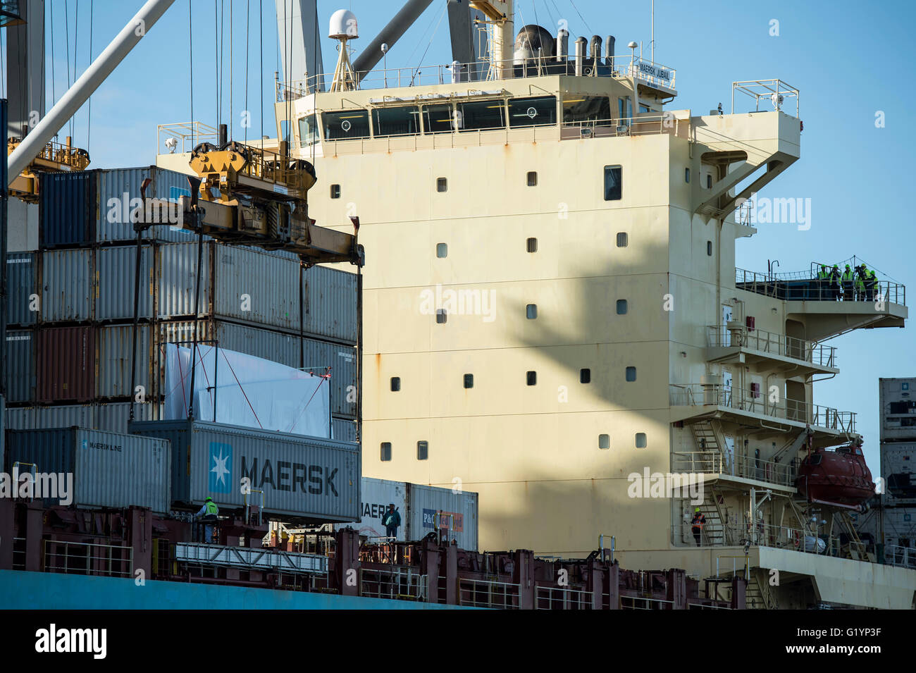 Containers are loaded on to the Maersk Container ship Maersk Jubail ...