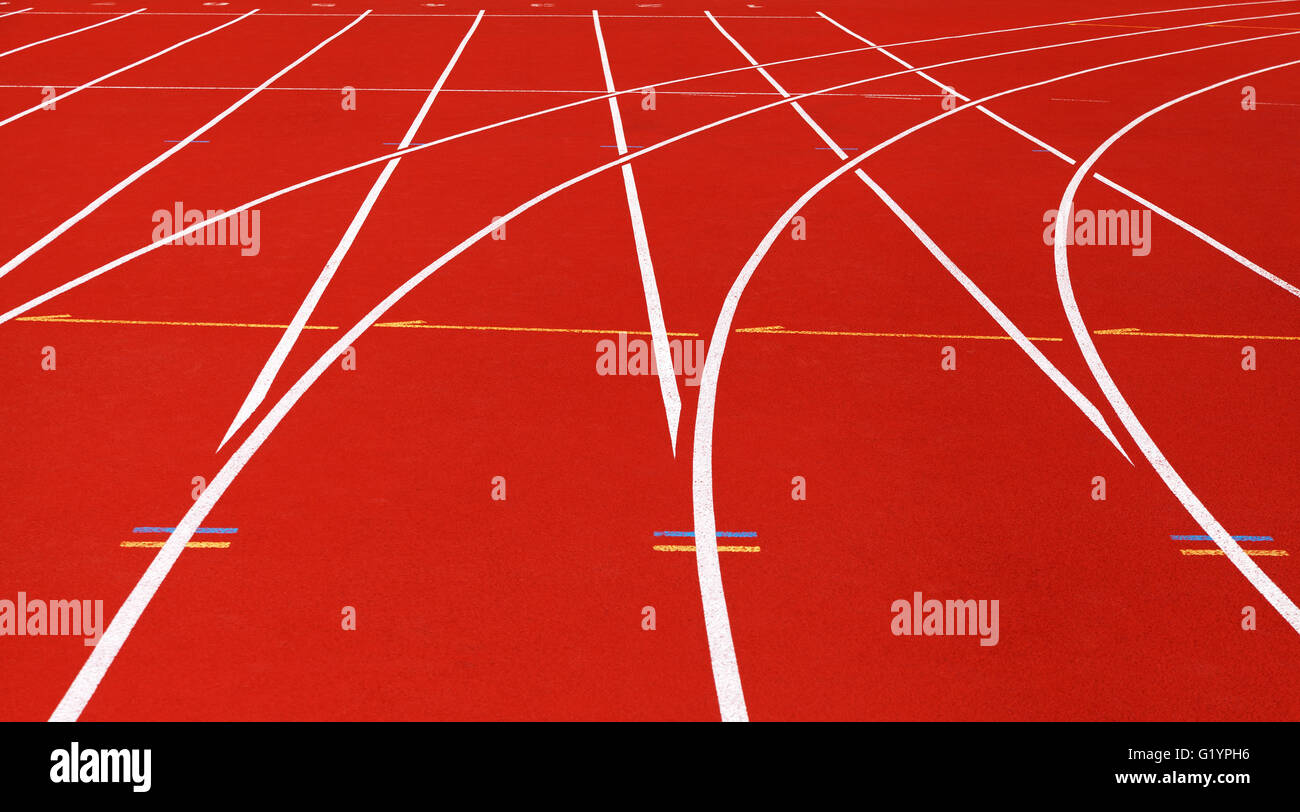 Red running tracks in sport stadium Stock Photo - Alamy