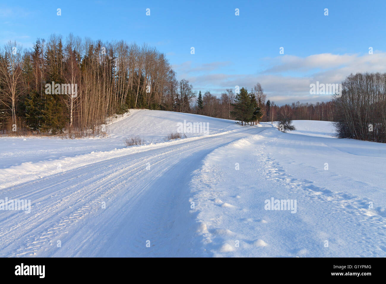 Winter landscape with snowy country road Stock Photo - Alamy