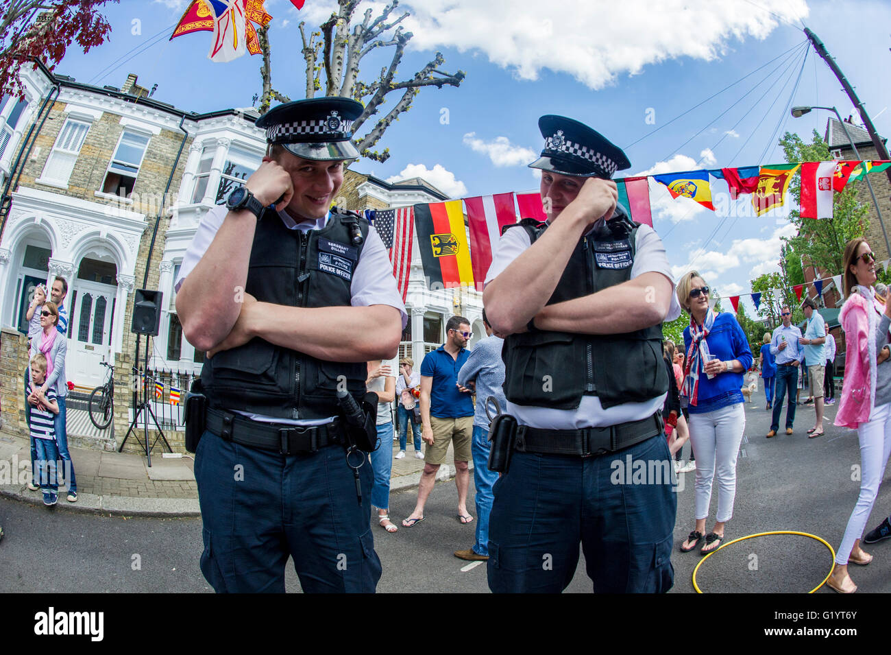 Policeman talking on radio hi-res stock photography and images - Alamy