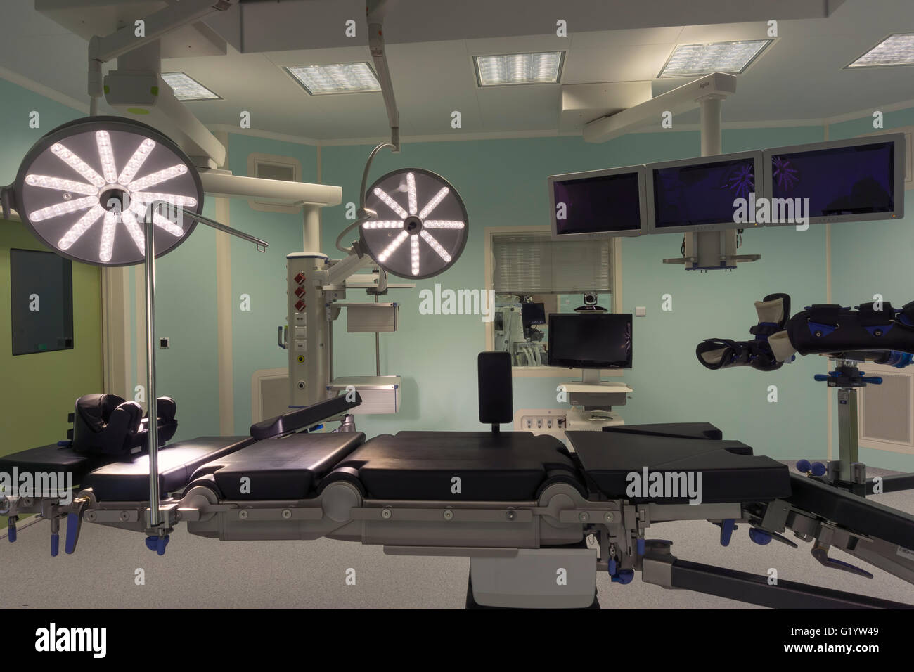 Modern operating room in hospital with equipment and medical devices ...