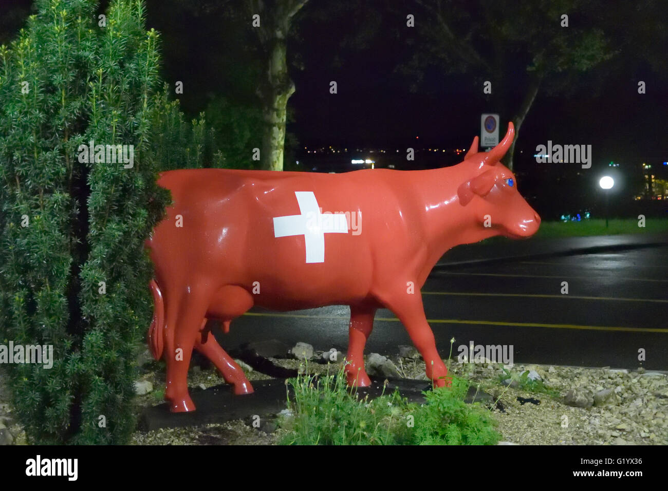 Red Swiss cow with a white cross, Zurich Glattbrugg CH Stock Photo - Alamy