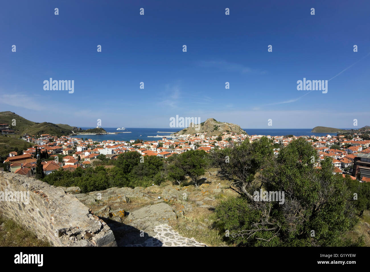 Dabia fortress hillside in Myrina city and its castle afar. Lemnos or ...