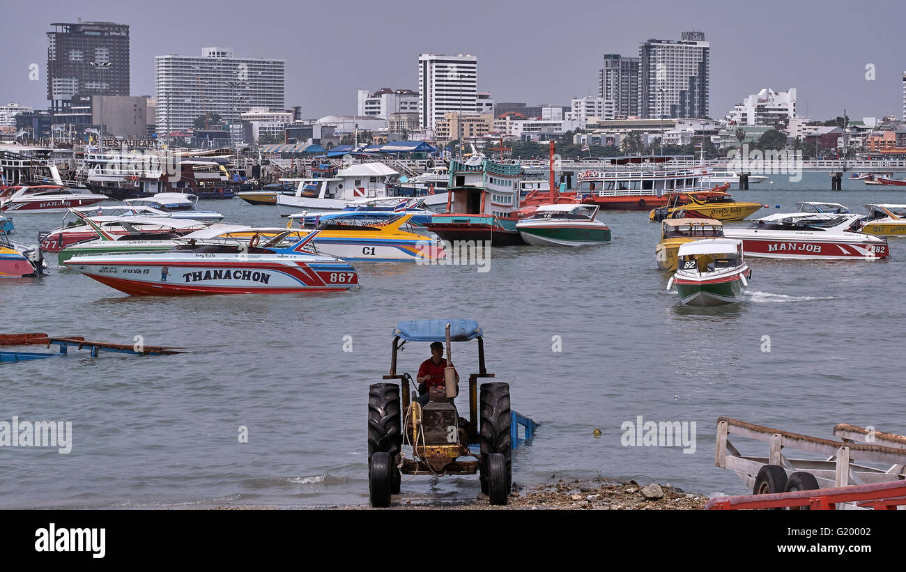 Pattaya harbour. Tourists boats and city overview. Pattaya harbor ...