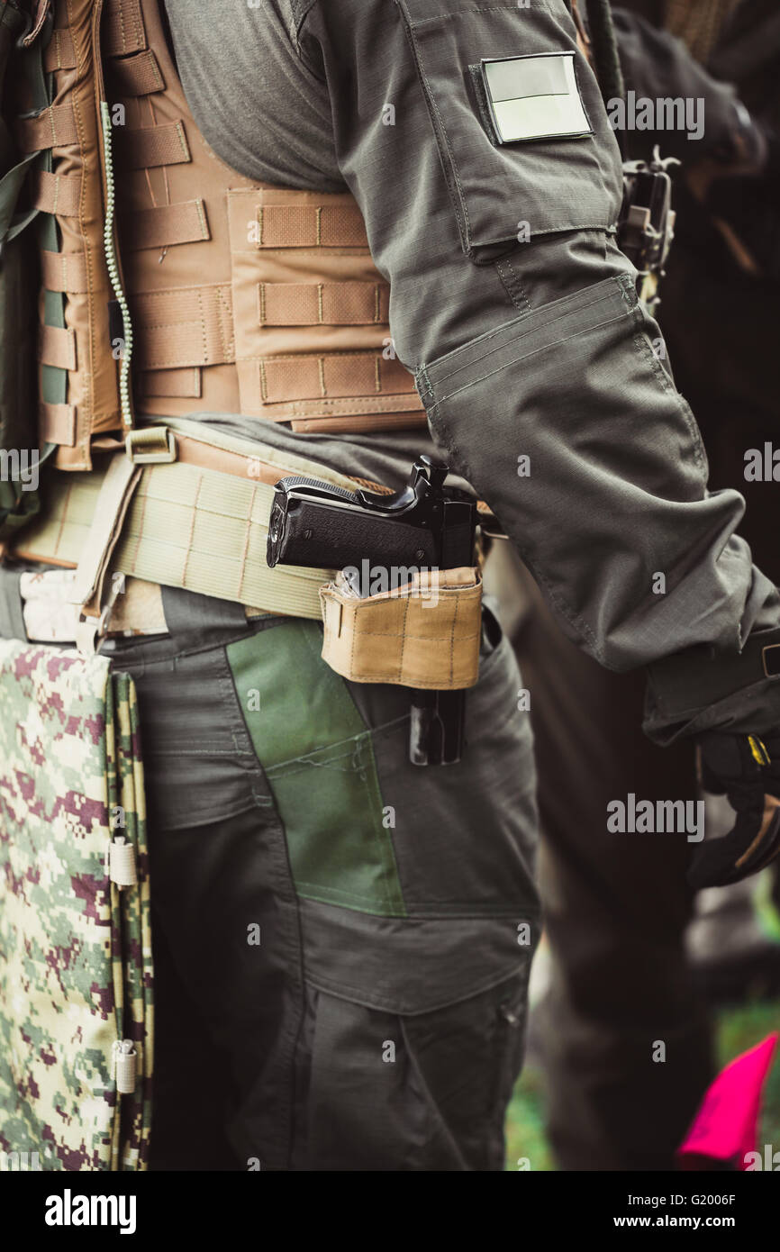 men in military uniform with weapon on a mission Stock Photo - Alamy