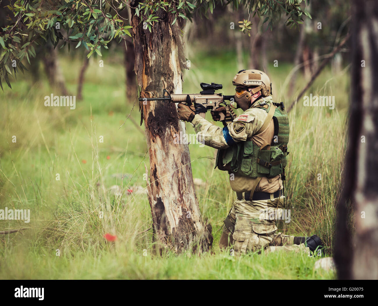 men in military uniform with weapon on a mission Stock Photo - Alamy