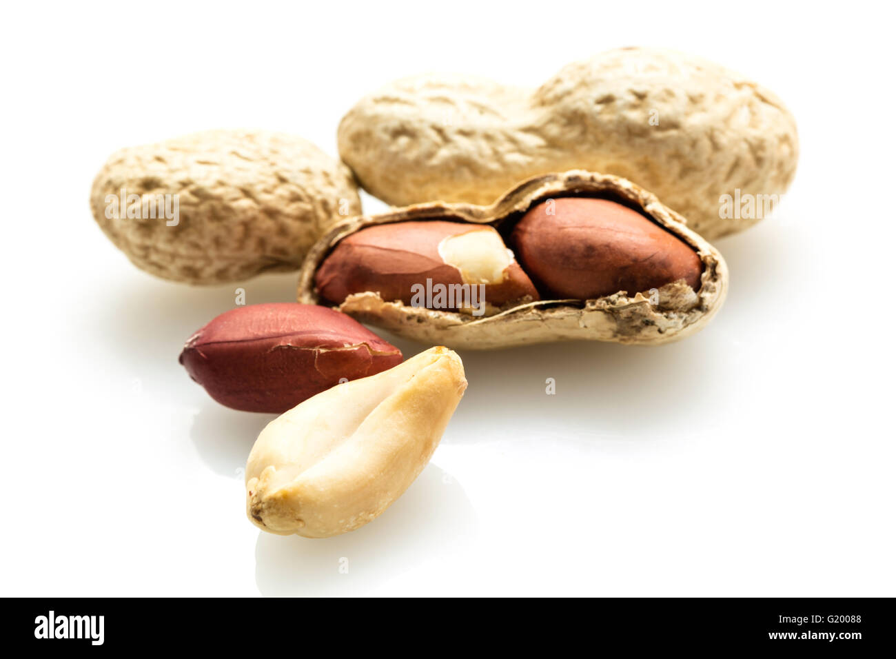 groundnut in the skin close-up on a white background Stock Photo - Alamy