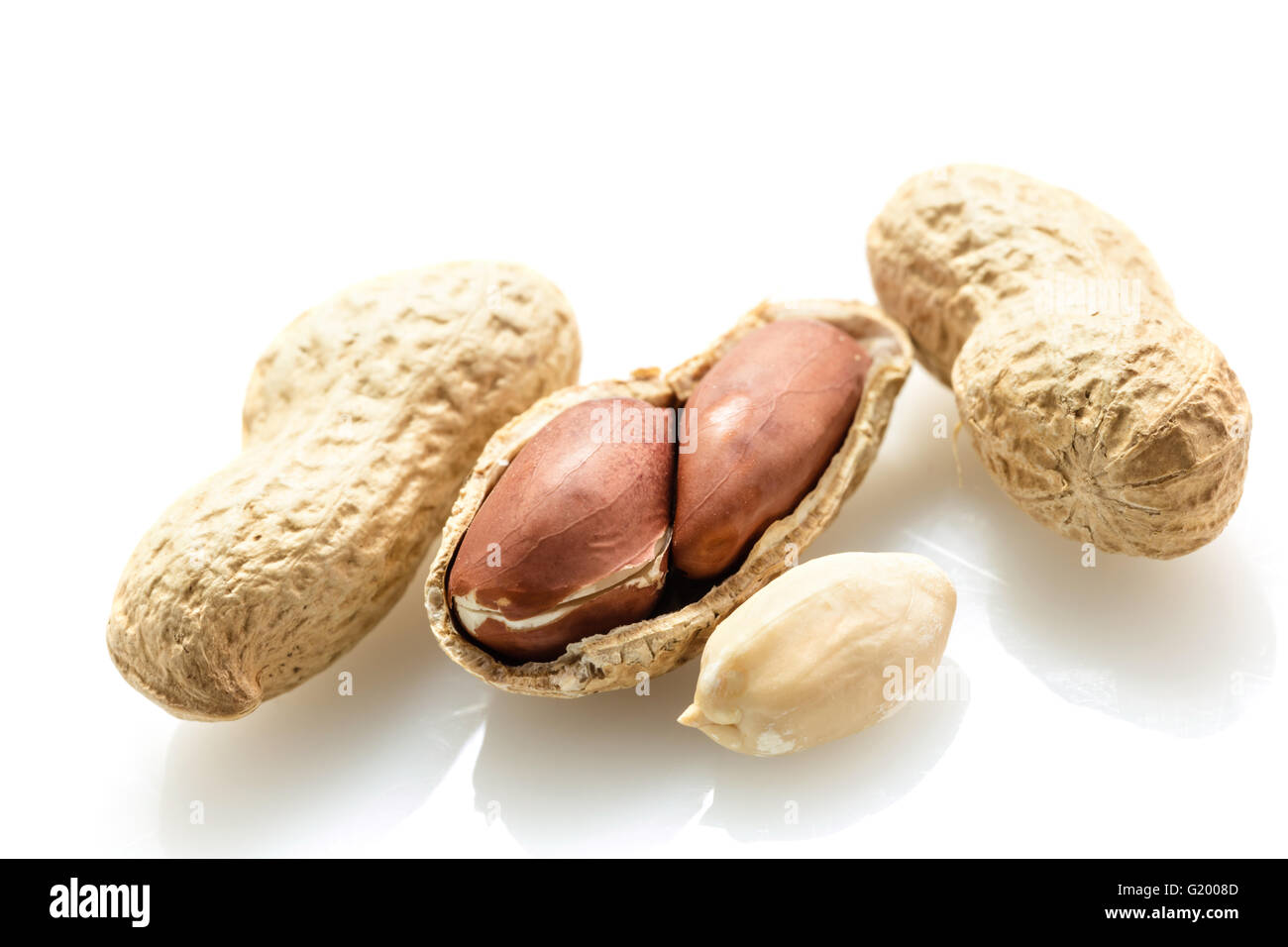 groundnut in the skin close-up on a white background Stock Photo - Alamy