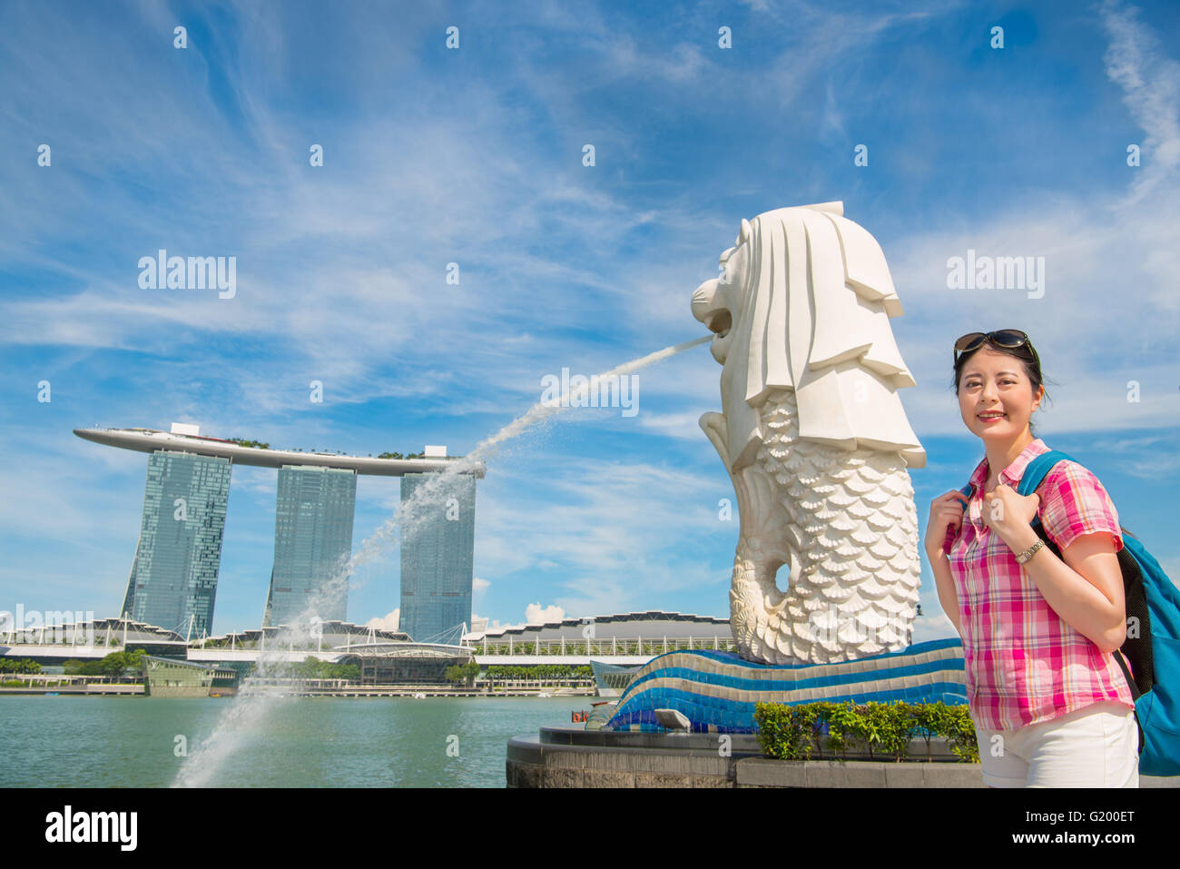 Happy Asia woman Travel in Singapore near Merlion Park Stock Photo - Alamy