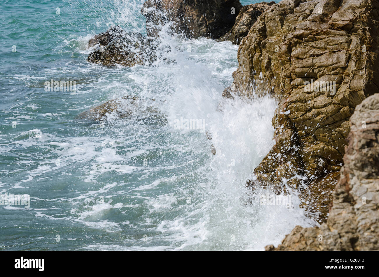 Sea Wave Attacked the Rock Stock Photo - Alamy