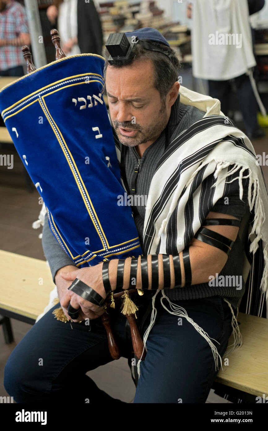 After a Torah reading and before it's returned to the Holy Ark, A ...