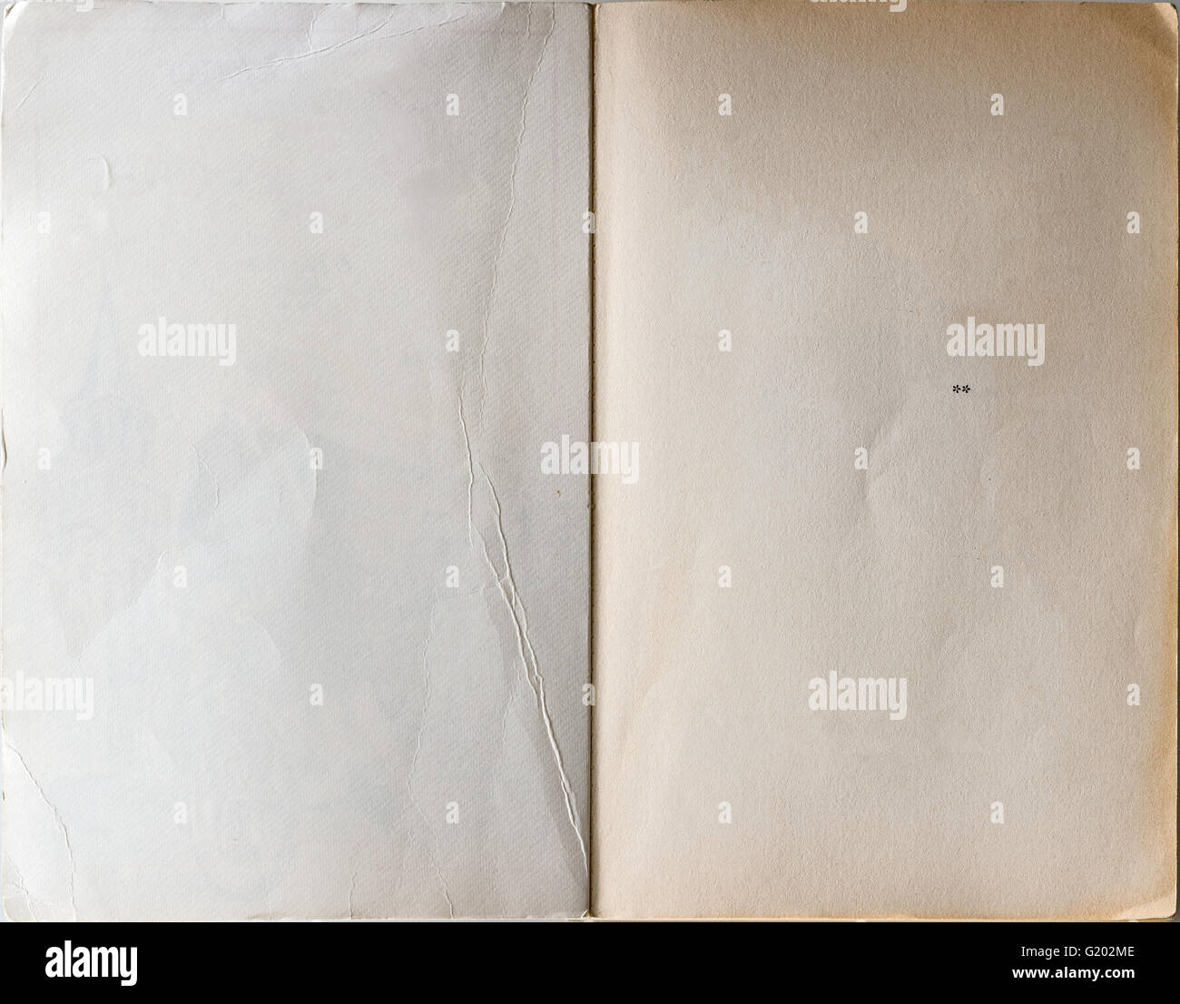 Old book opened to the first page showing blank pages inside Stock ...