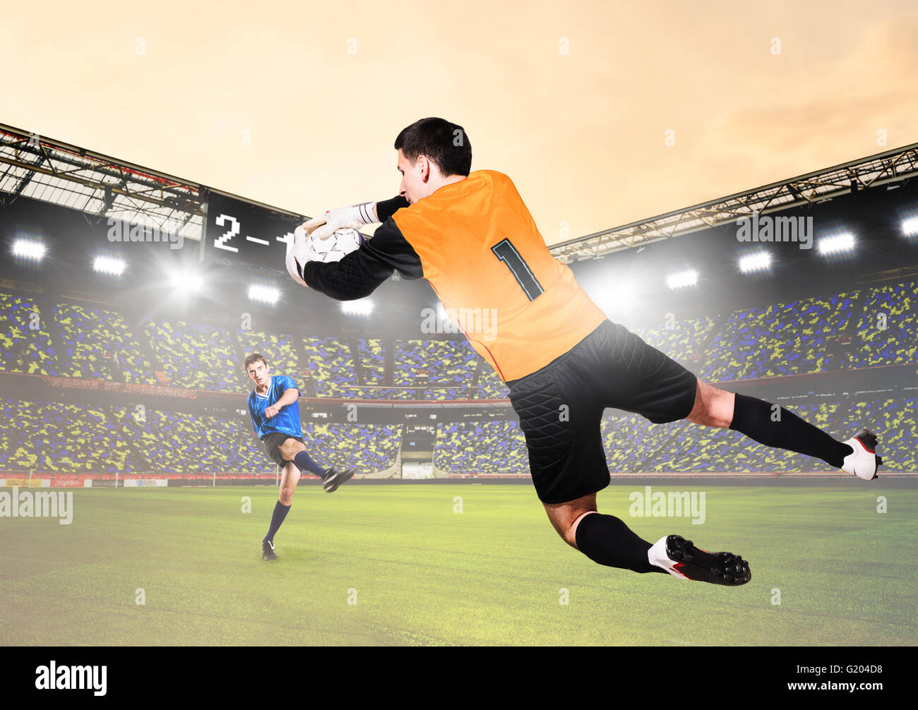 goalkeeper is catching ball Stock Photo - Alamy