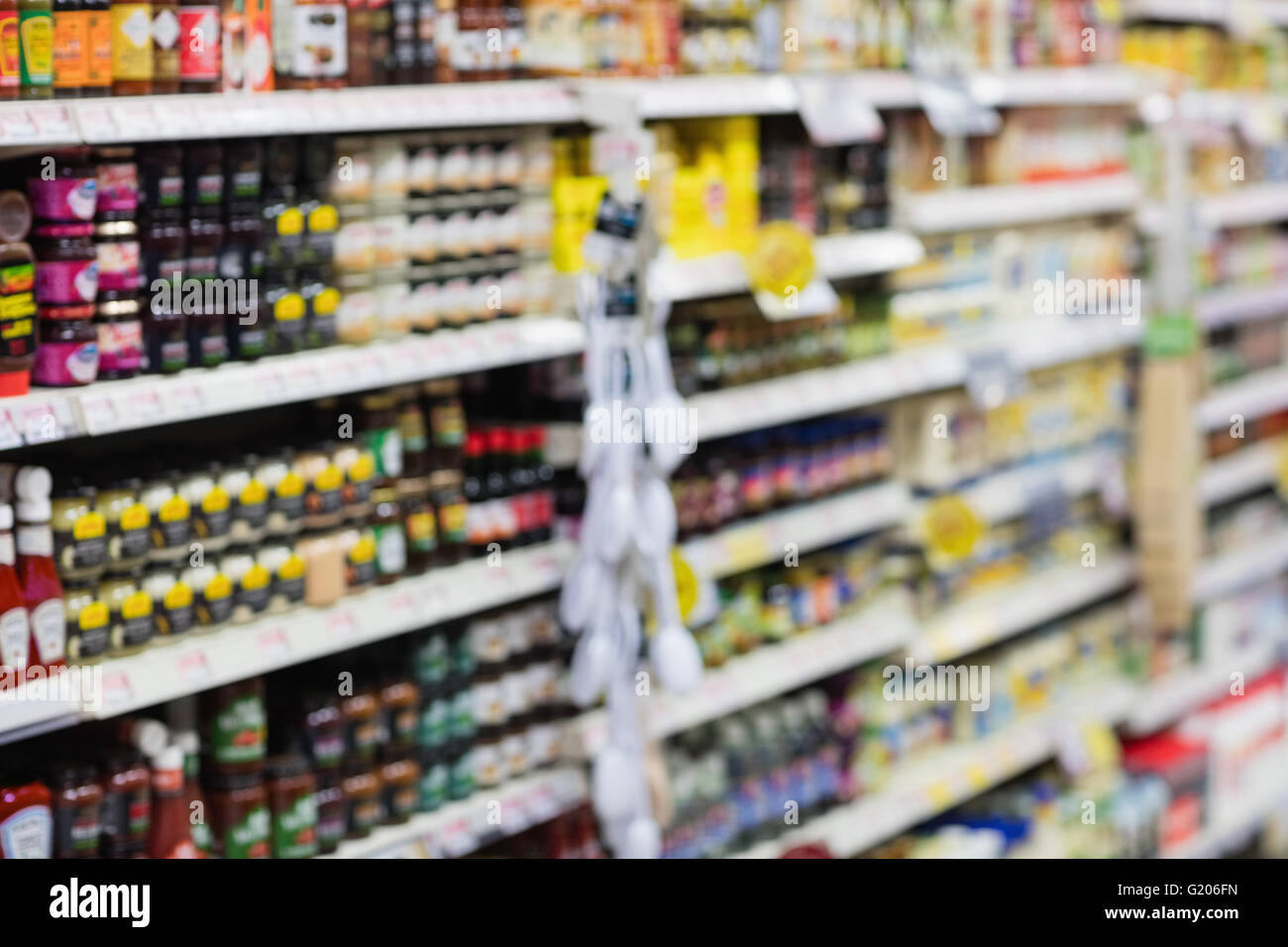 Side view of supermarket shelves Stock Photo - Alamy
