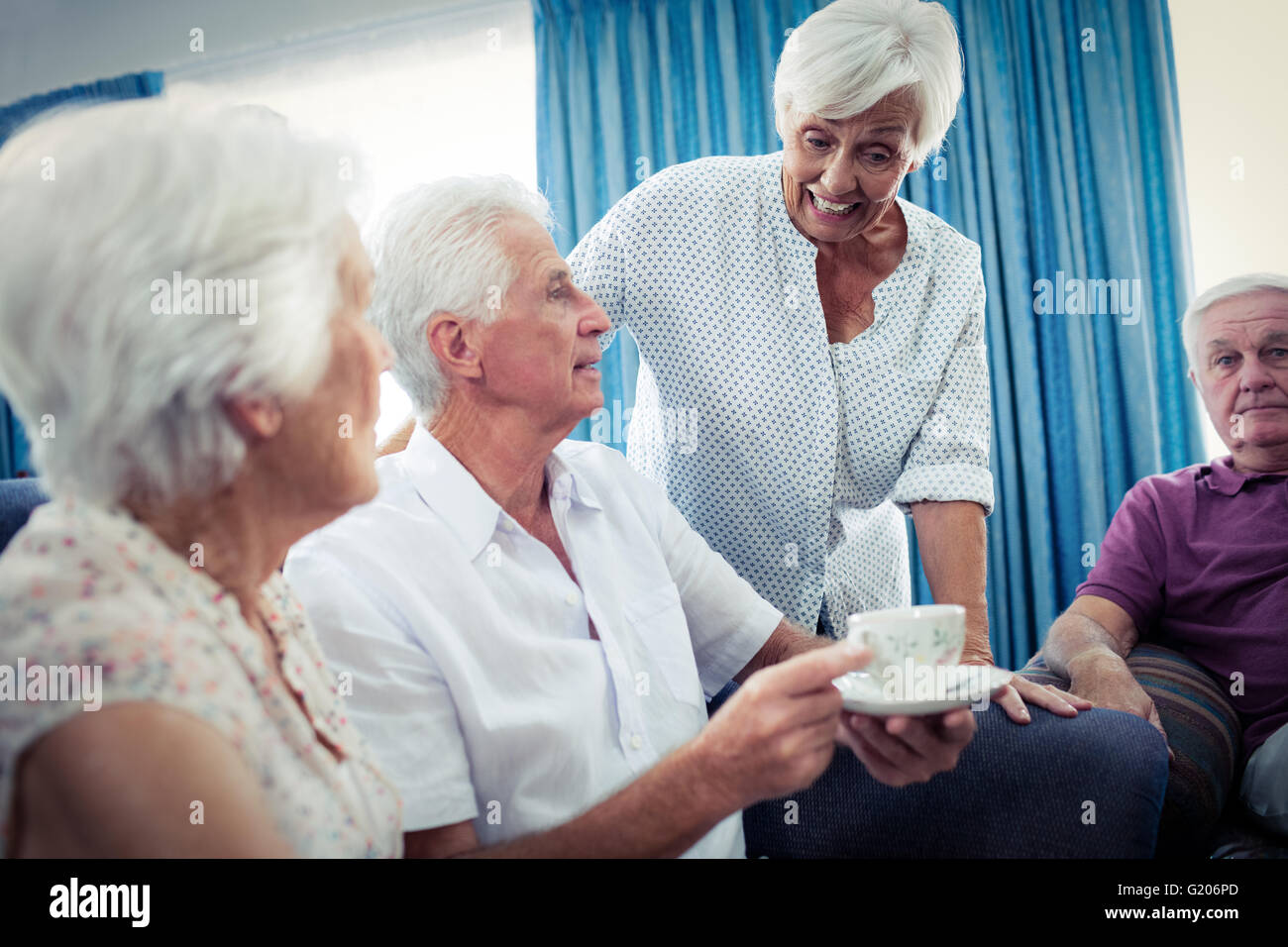 Group of seniors interacting Stock Photo - Alamy