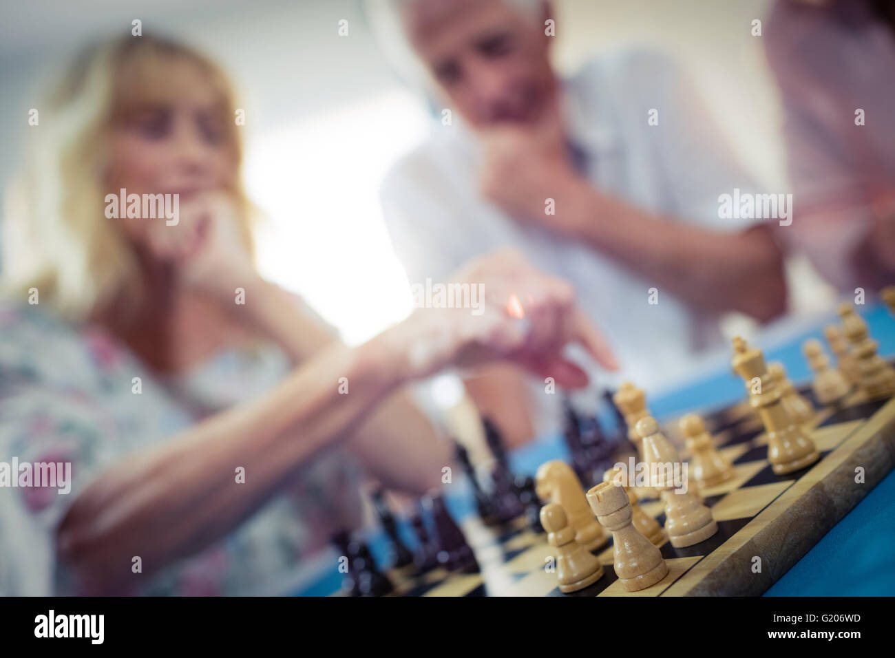 Group of seniors playing chess Stock Photo - Alamy